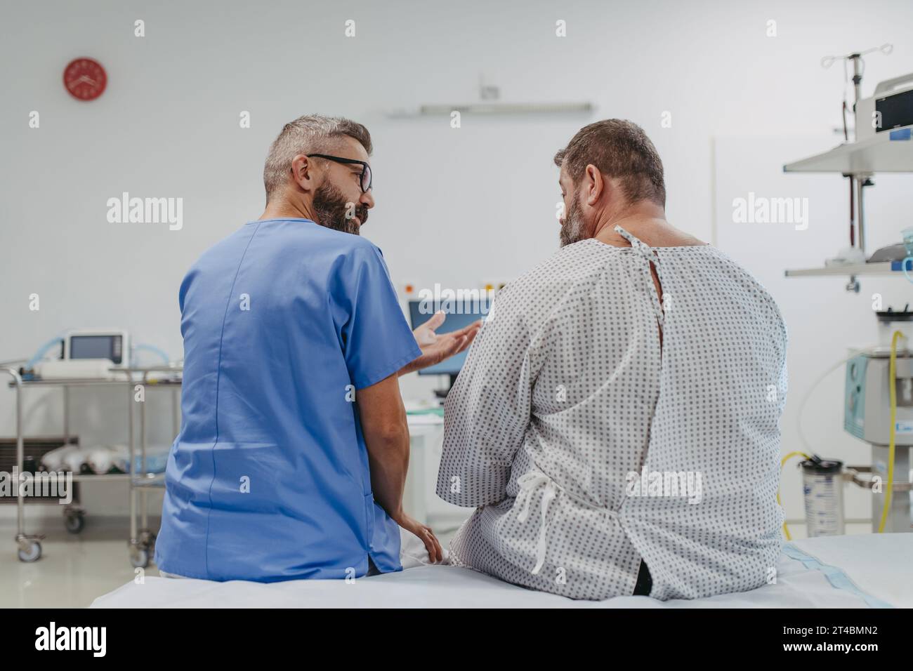 Supportive doctor soothing a worried overweight patient, discussing ...