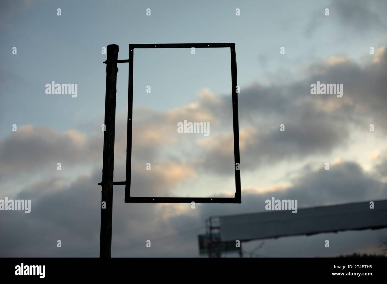 Empty frame against sky. Rectangle black. Picture insertion frame. Sign ...