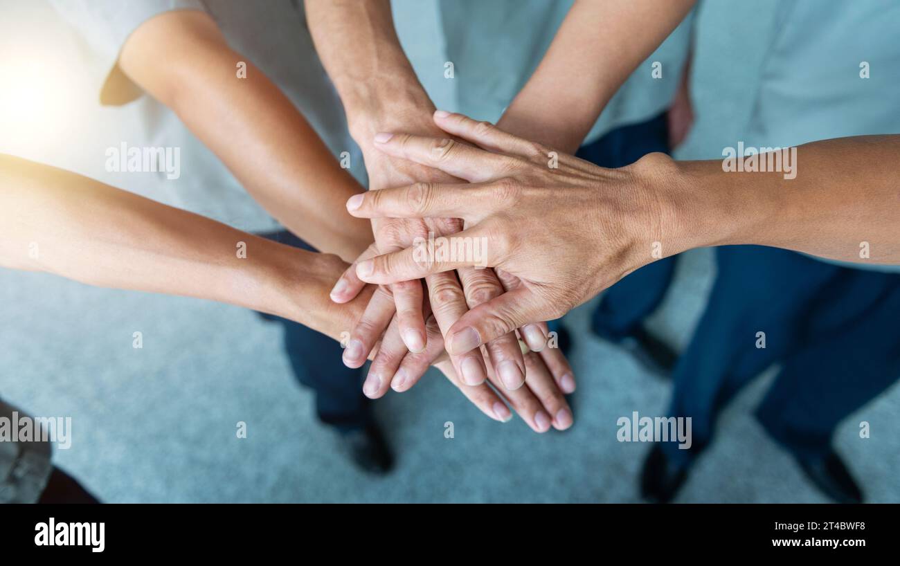 People putting hands together, team work concept Stock Photo - Alamy