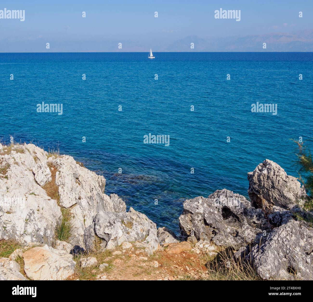 Yacht sailing by Cape Agia Ekatarinis the most northerly point of Corfu ...