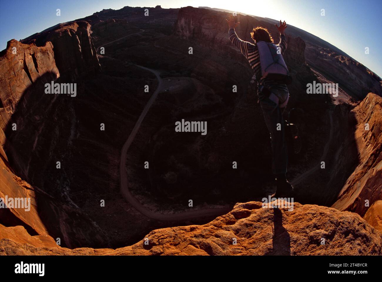 man base jumping off cliff, Utah (Fisheye Stock Photo - Alamy