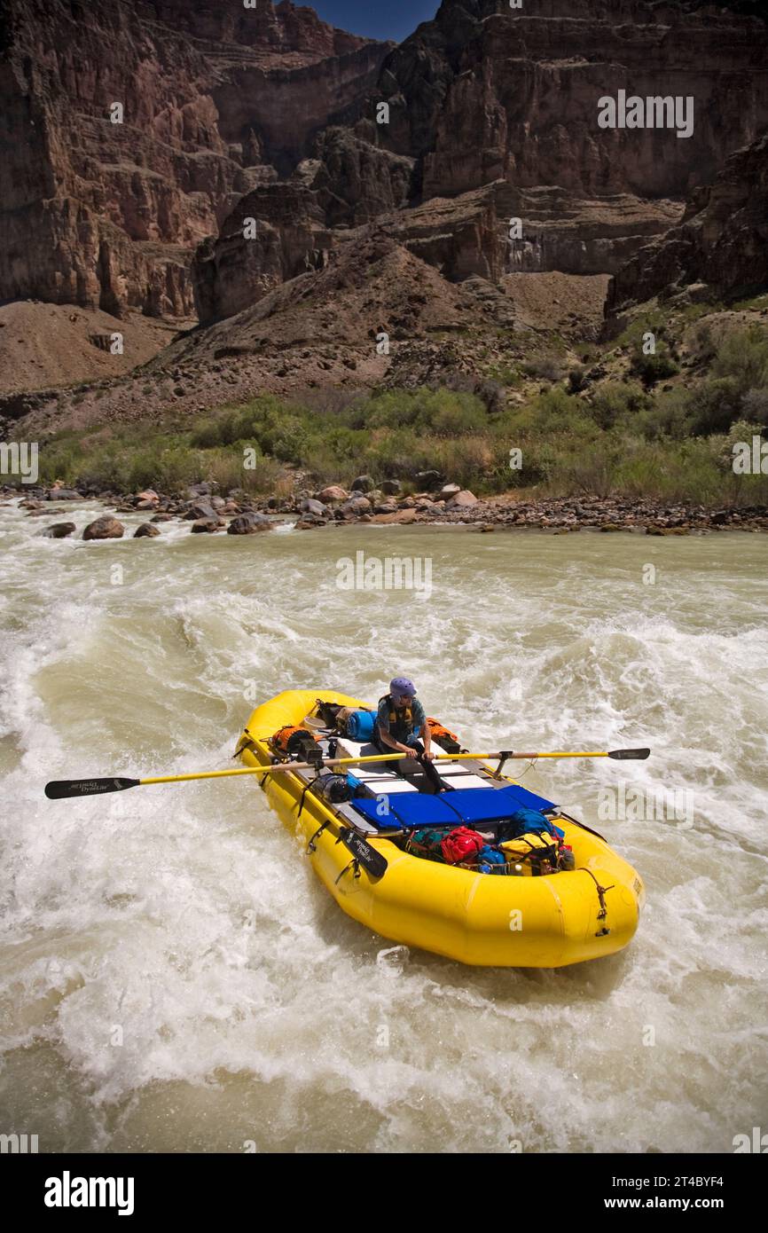 Man rowing raft down river, Grand Canyon, Arizona Stock Photo - Alamy