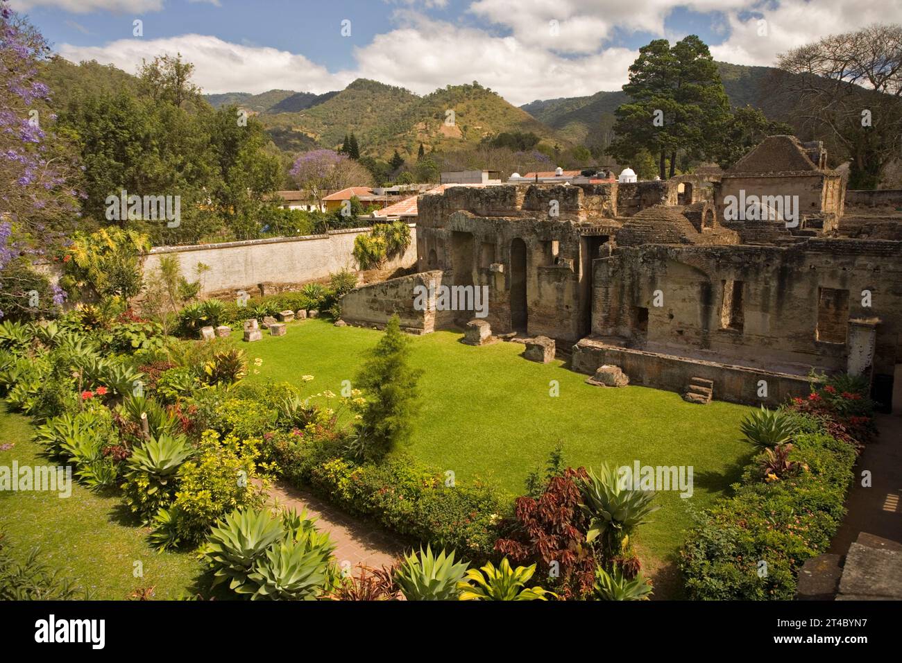 A garden at The ruins of Las Capuchinas convent, Antigua, Guatemala ...