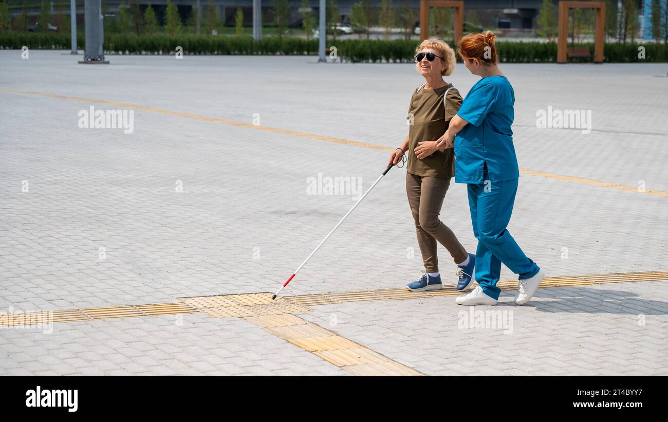 Nurse elderly blind woman hi-res stock photography and images - Alamy