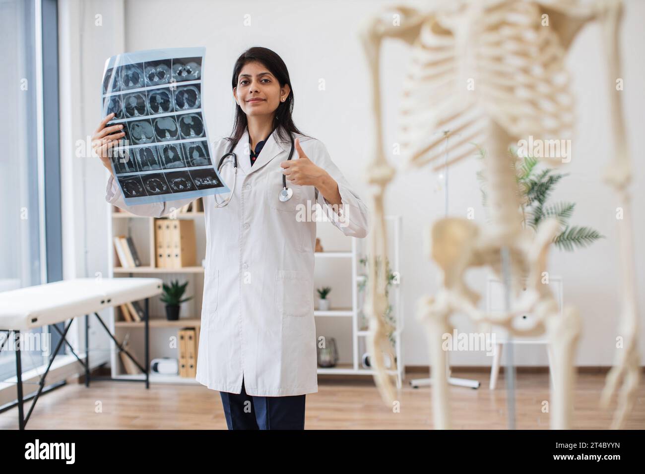 Female indian doctor holding x ray hi-res stock photography and images ...