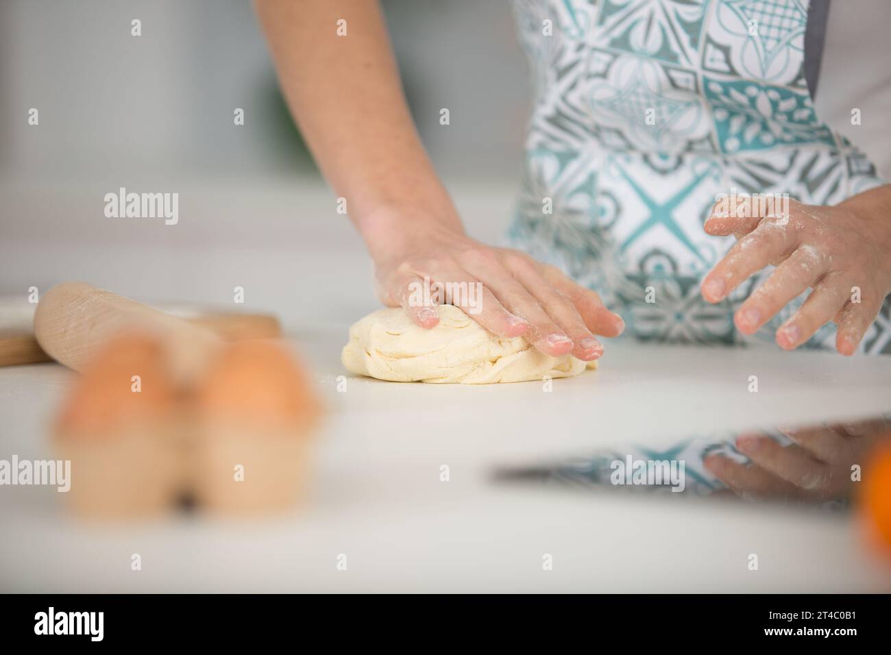 Old woman making pies dough hi-res stock photography and images - Alamy