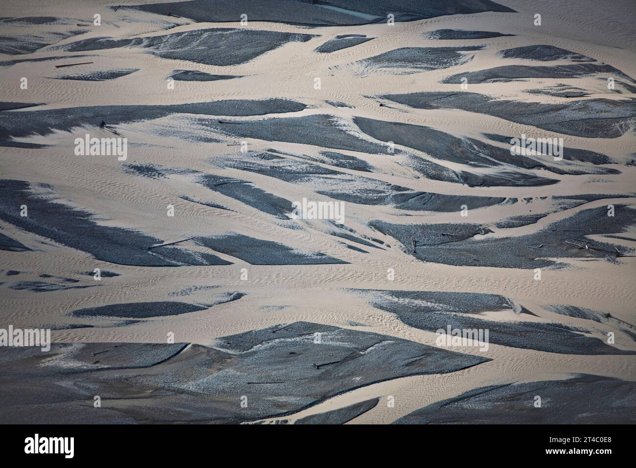 Ariel view of braided river flowing through valley in the Wrangell-St ...