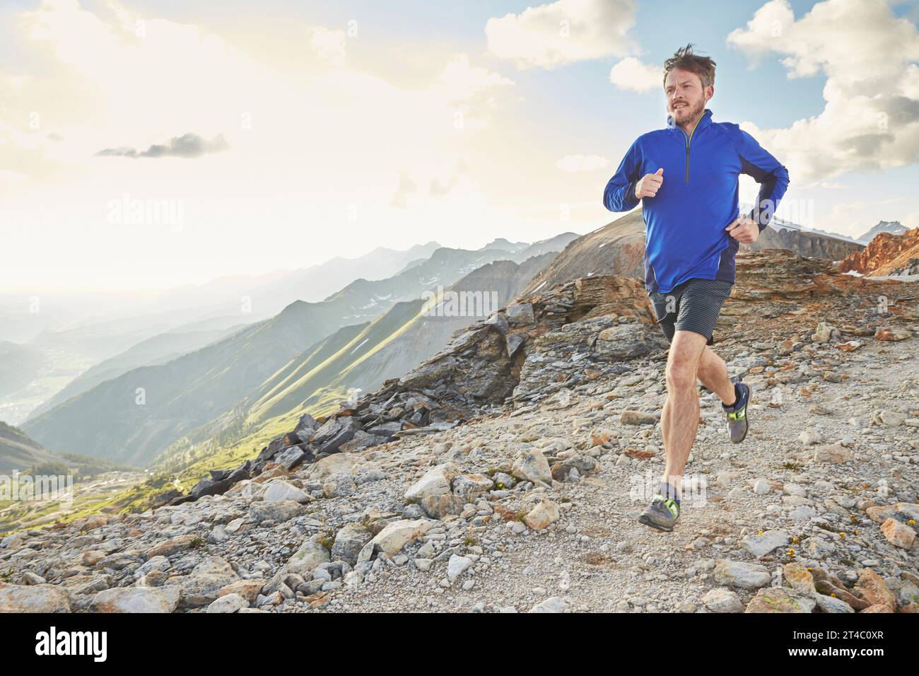 Ultra runner, Ben Clark trail running in the San Juan Mountains high ...