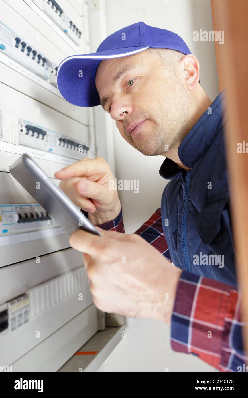 engineer working with switches on circuit breaker Stock Photo - Alamy