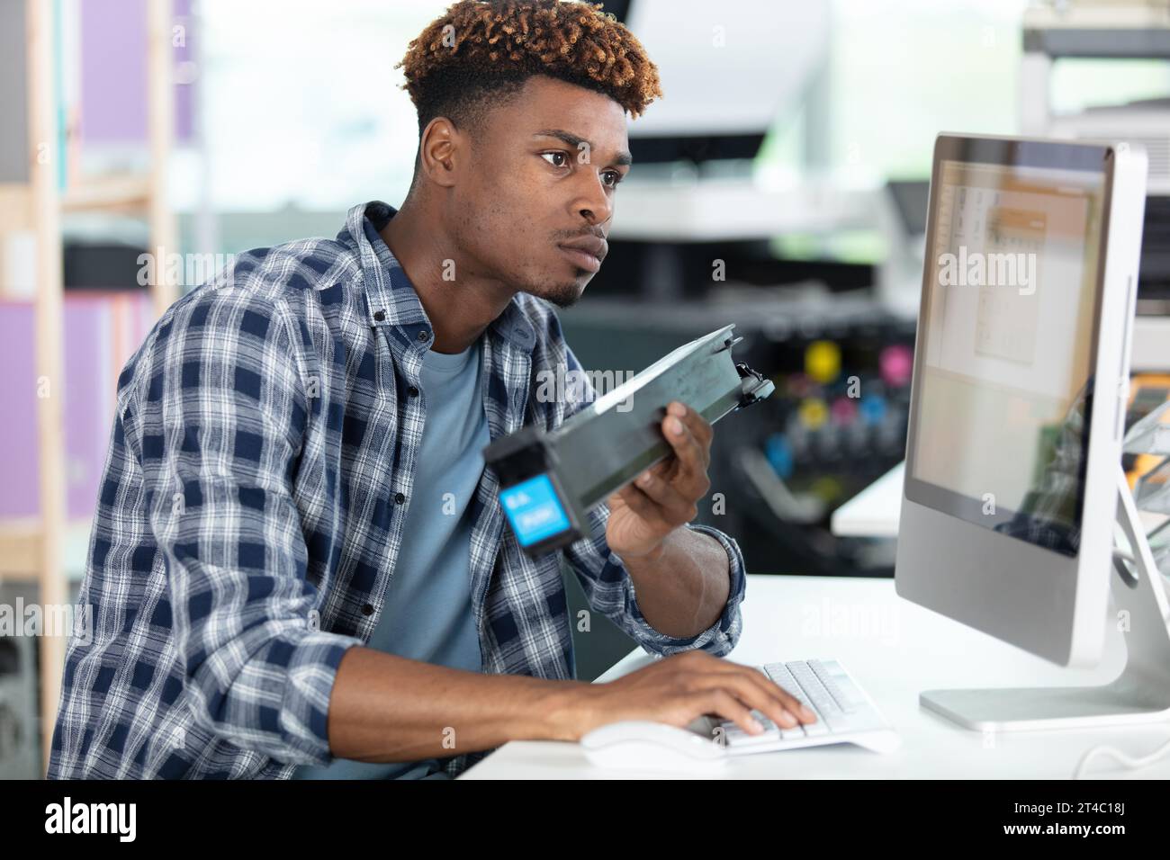 Using a desktop computer hi-res stock photography and images - Alamy