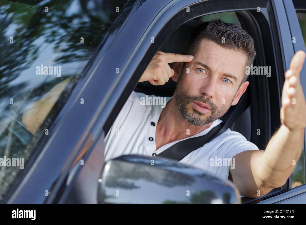 picture of an angry male driver making gesture Stock Photo - Alamy