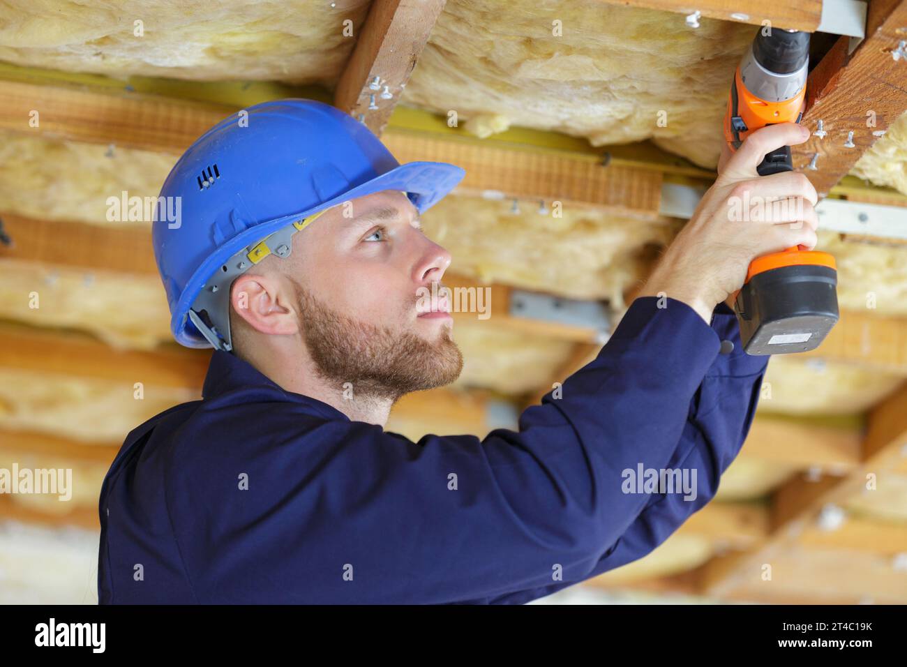 Man builds wall home hi-res stock photography and images - Alamy