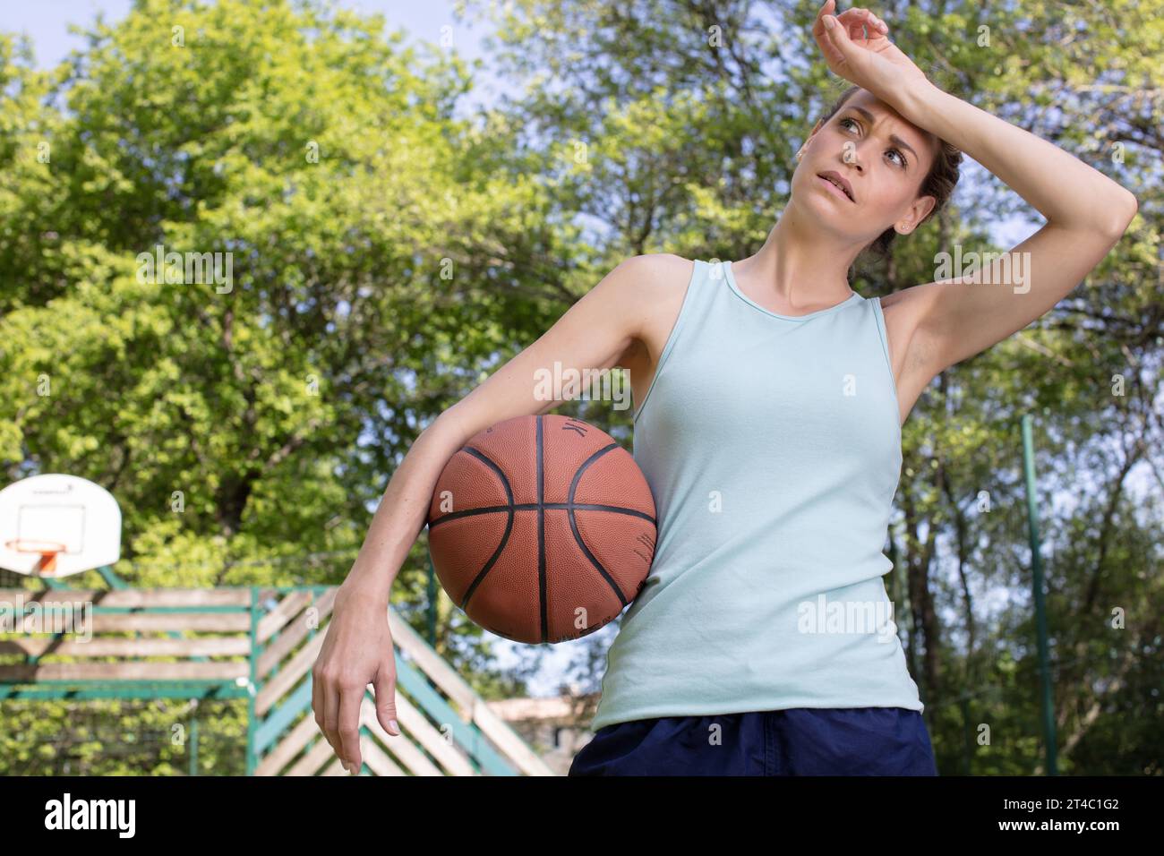 Hot person wiping brow hi-res stock photography and images - Alamy