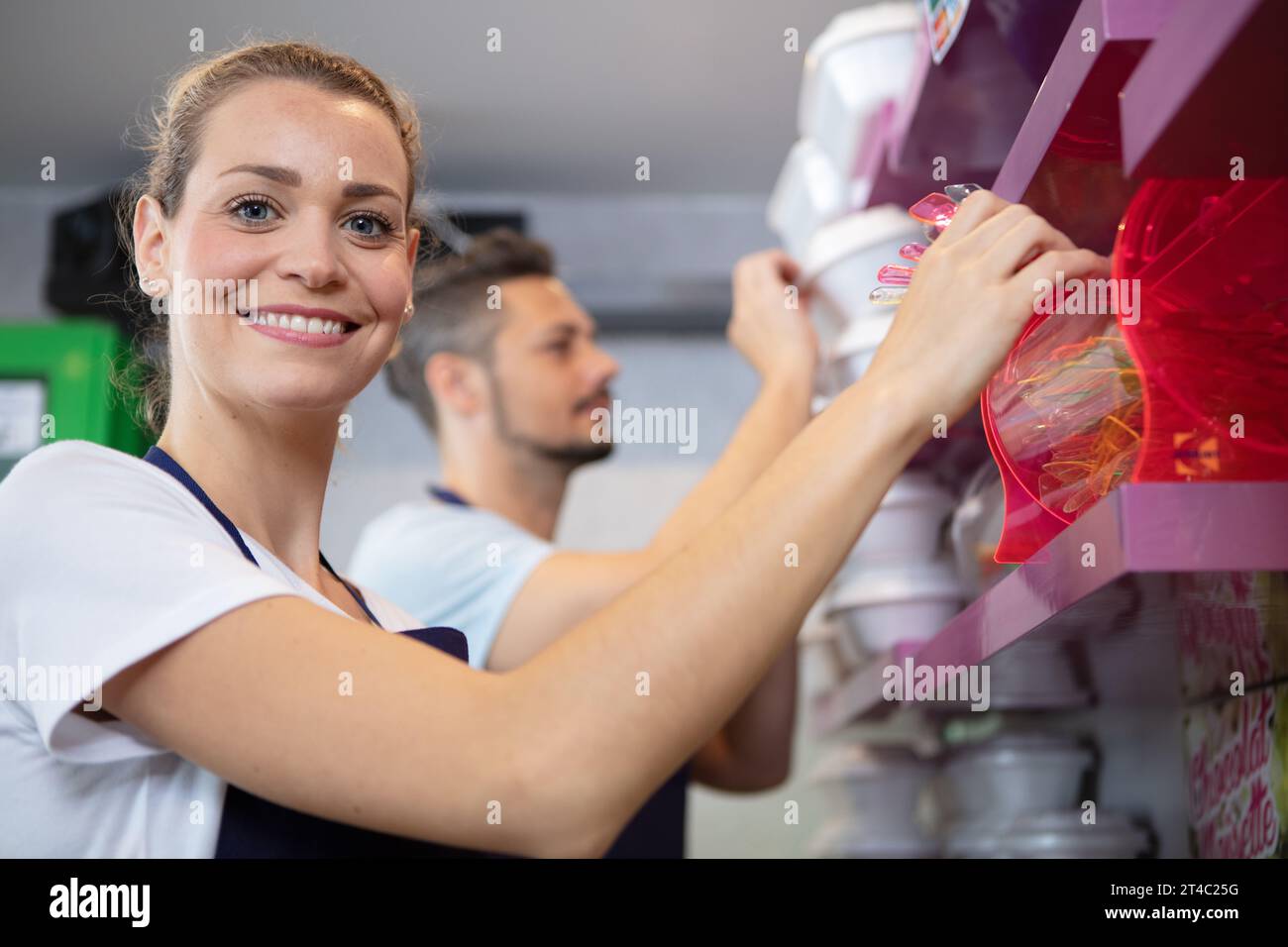 female worker in a seasonal ice-cream parlour Stock Photo - Alamy