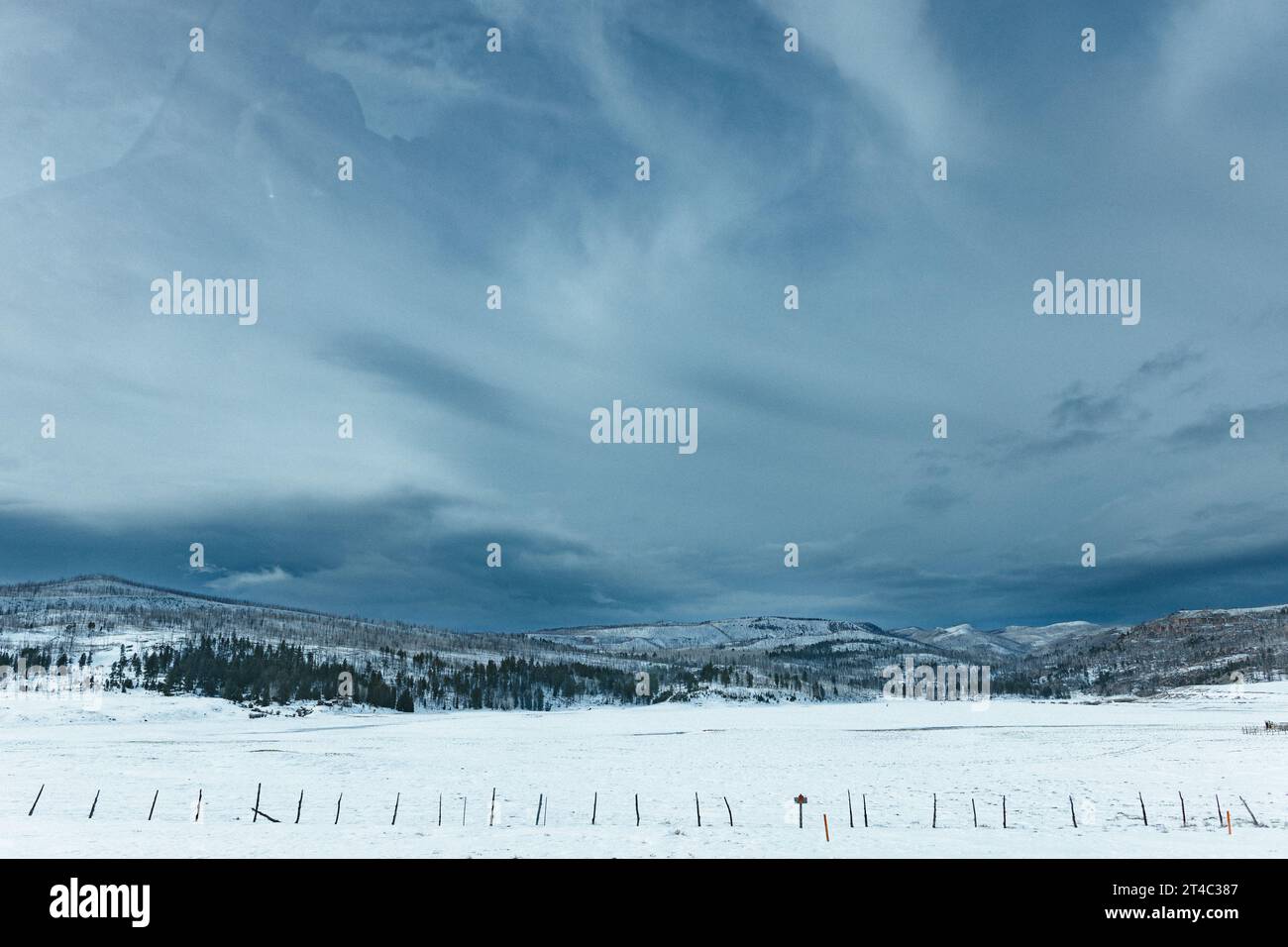 Snowy mountains storm clouds hi-res stock photography and images - Alamy