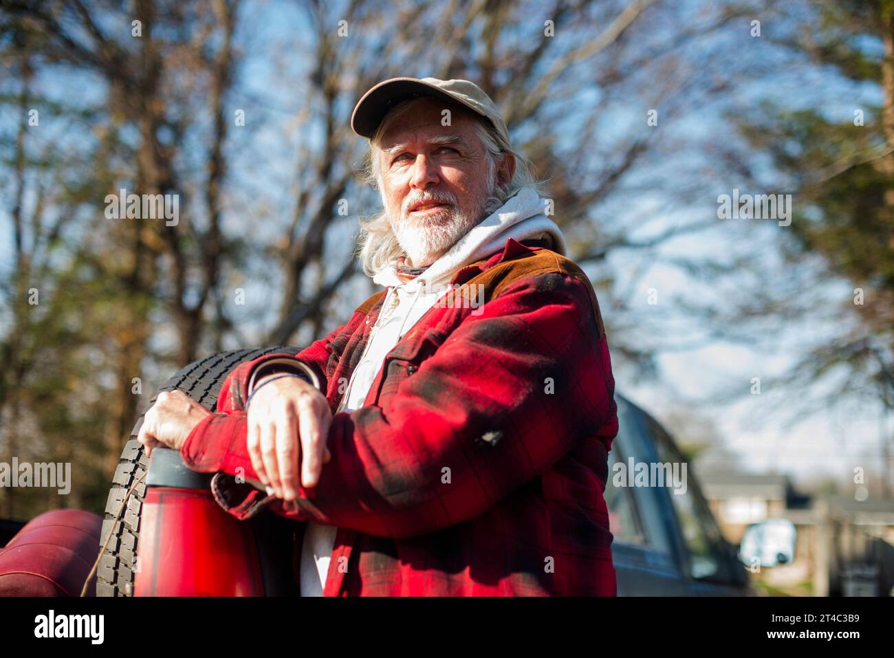 Senior Rural guy stands with old truck Stock Photo - Alamy