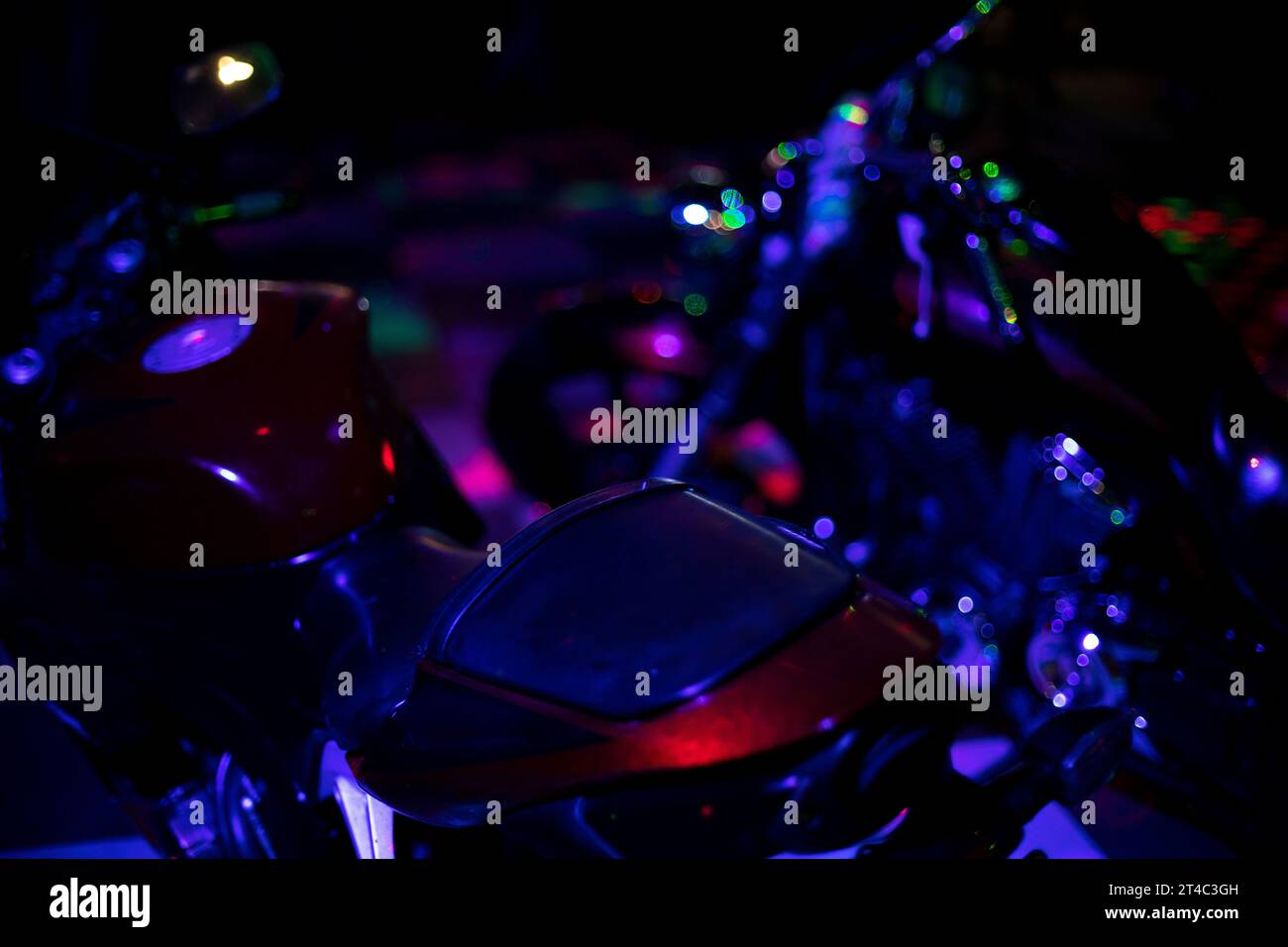 Motorcycle in dark. Transport in blue light. Bike at disco. Light on ...