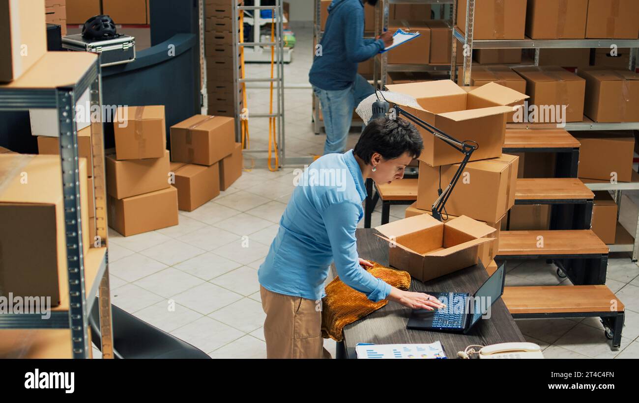 African american owner taking products hi-res stock photography and ...