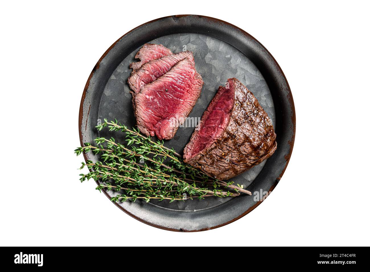 Grilled Rump sirloin steak sliced on a tray with herbs. Isolated on ...