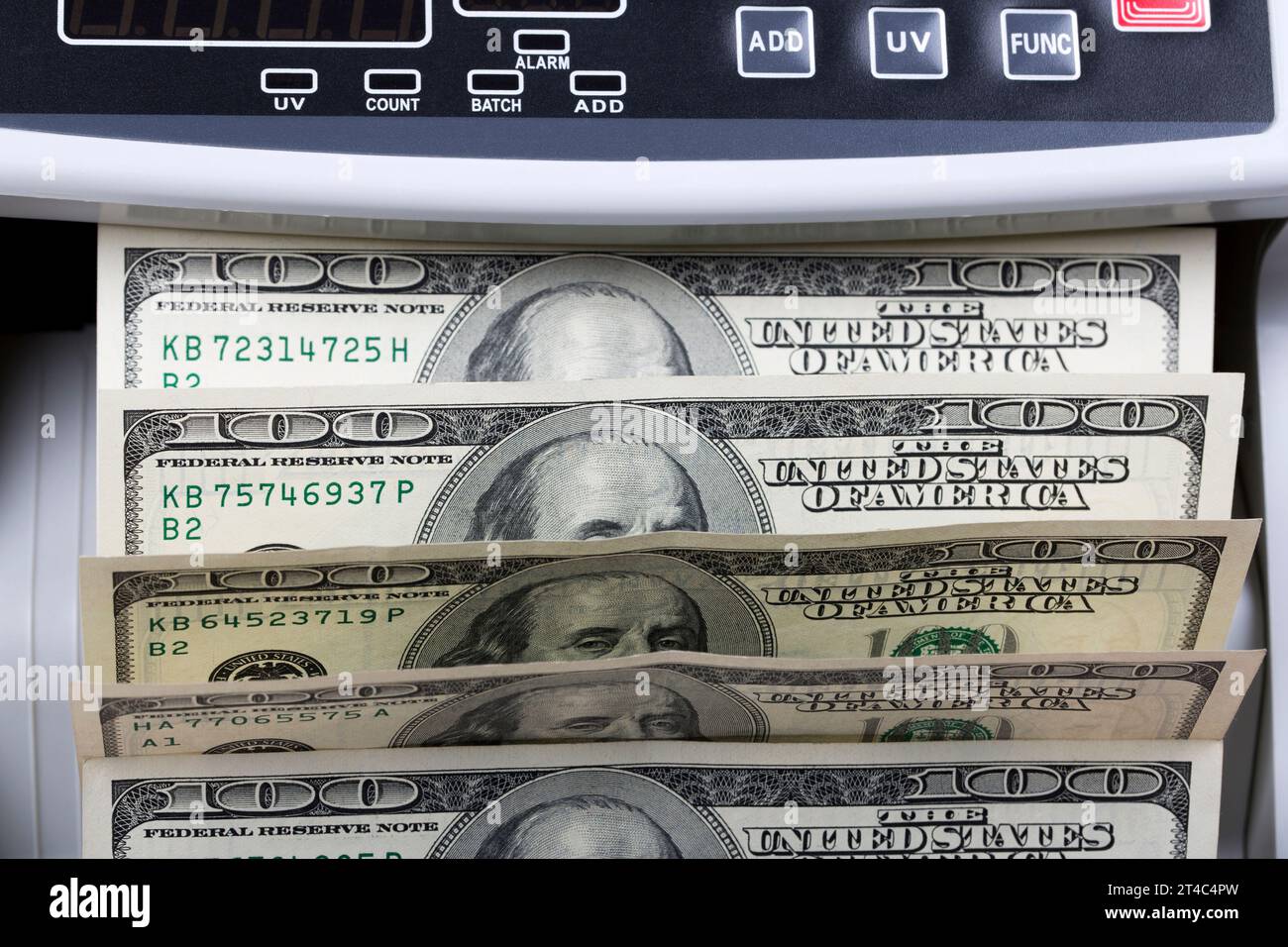 American money - dollars in a counting machine Stock Photo - Alamy