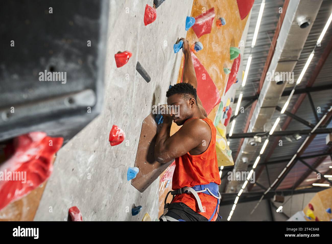 Handsome young man bouldering hi-res stock photography and images - Alamy