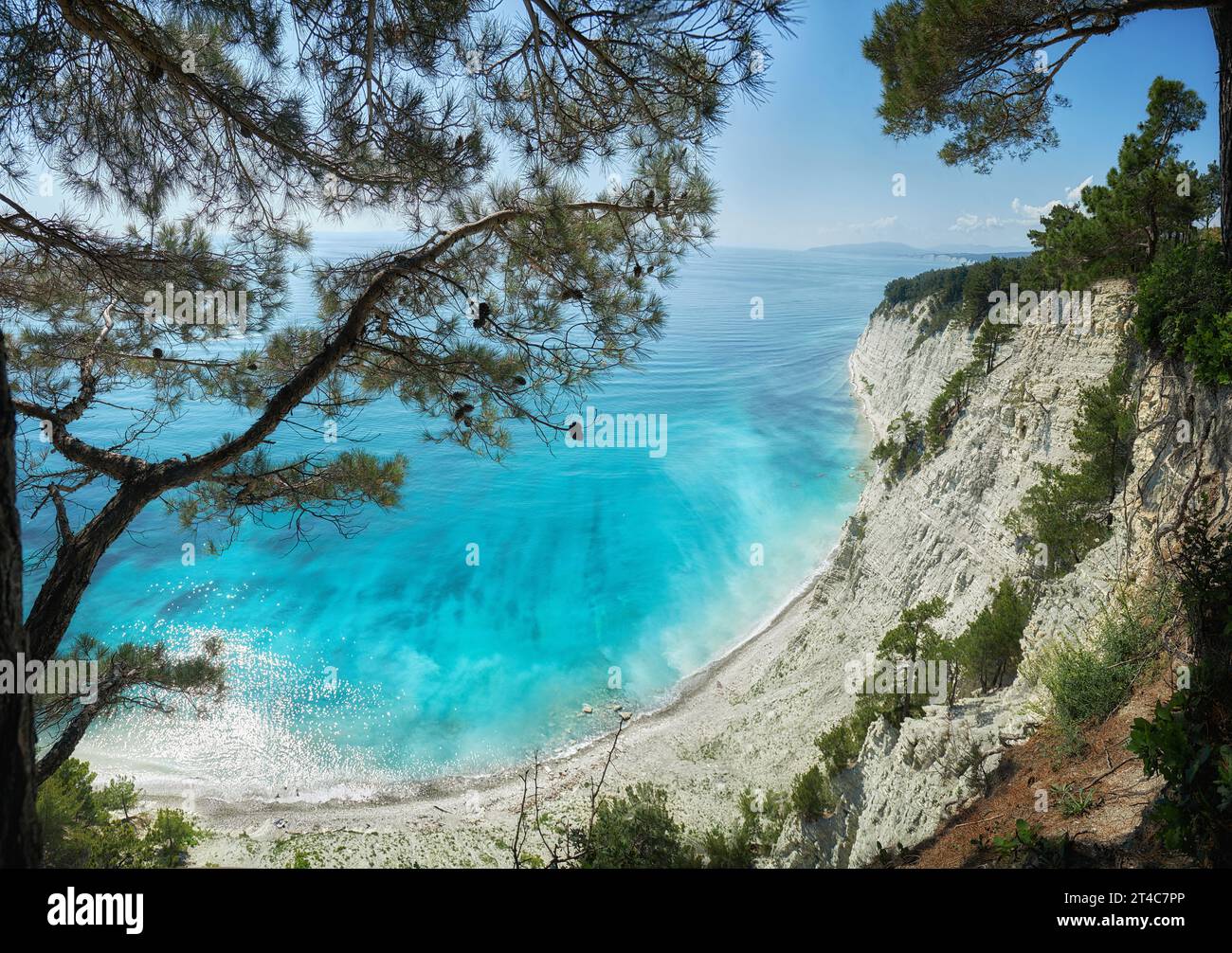 Blue azure sea against a background of white sheer cliffs. Seascape of ...
