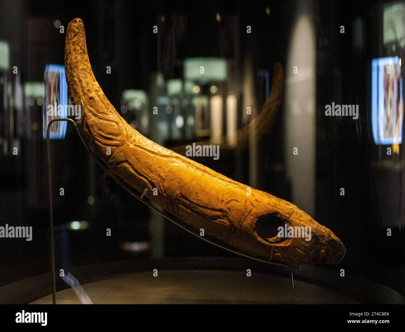 staff from El Castillo, engraving of a deer on a staff pierced and ...