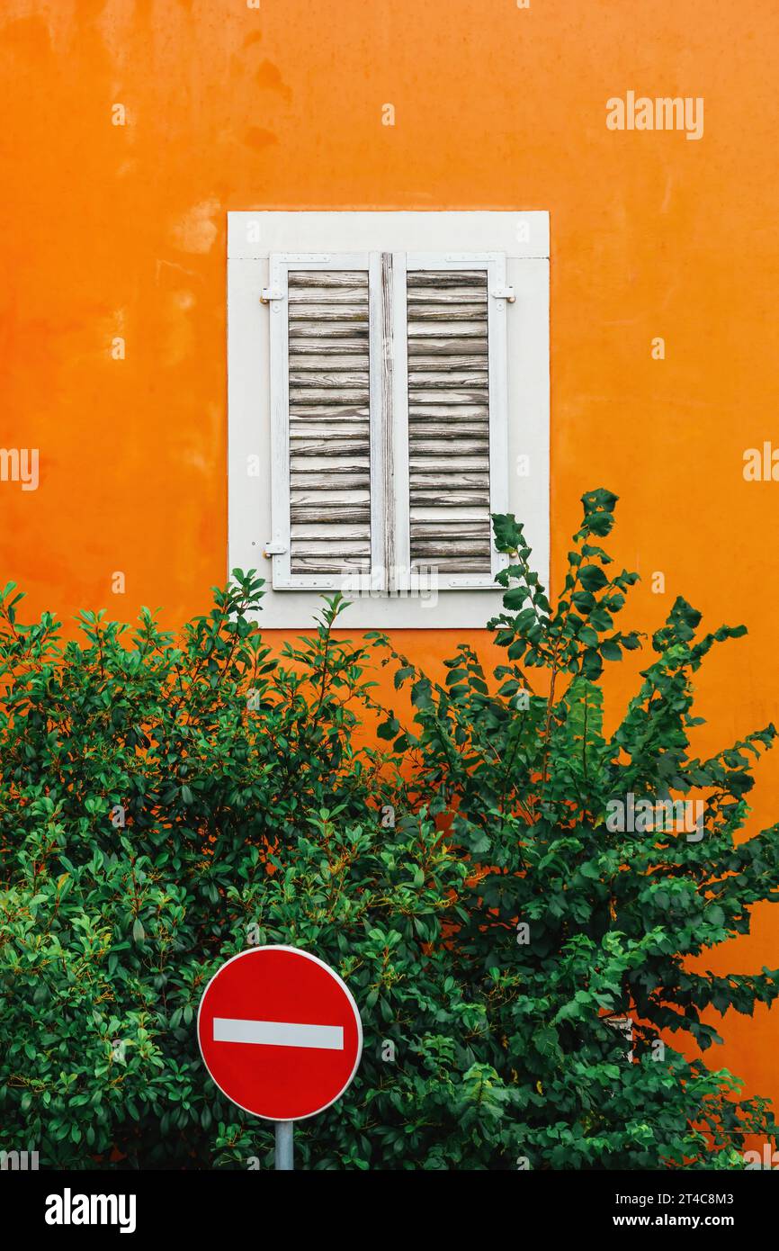 Colorful urban street scene - No Entry traffic sign next to an old ...