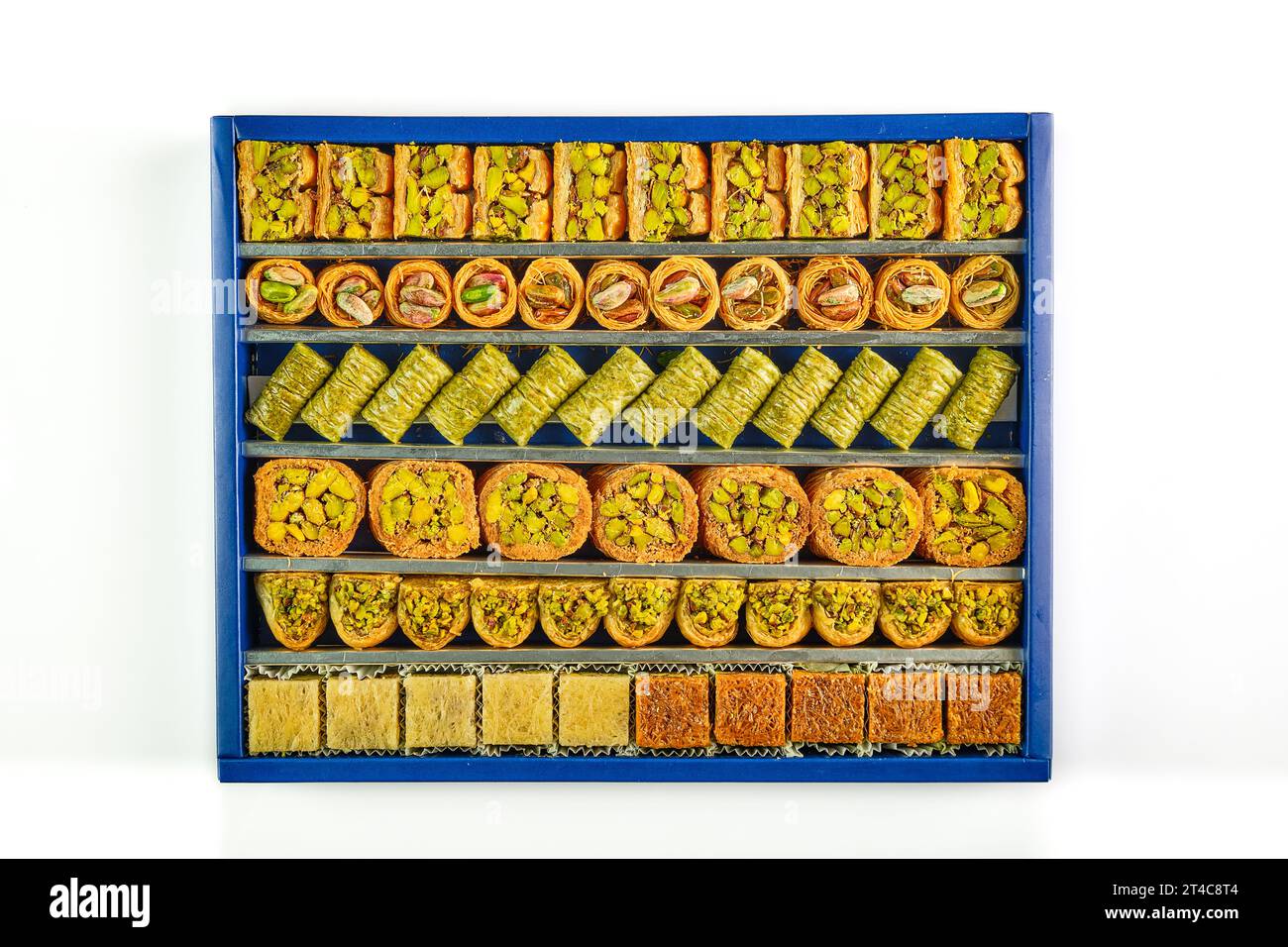 Arabic sweets boxes. Pictured from above showing several shapes and ...