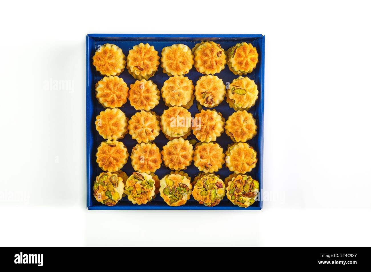 Arabic sweets boxes. Pictured from above showing several shapes and ...