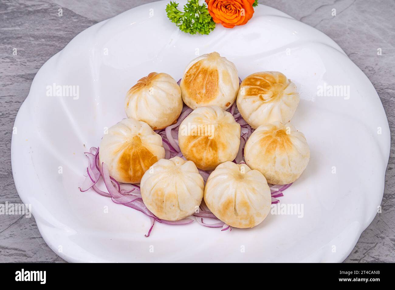 Pan Fried Baozi Stuffed with Pork Stock Photo - Alamy
