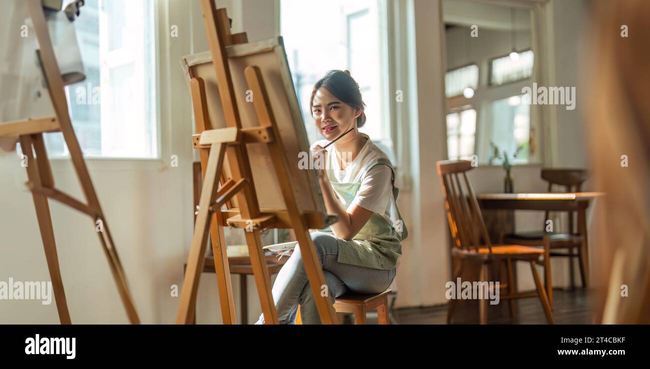 Talented Female Artist Working on a artist lifestyle. painting hobby ...