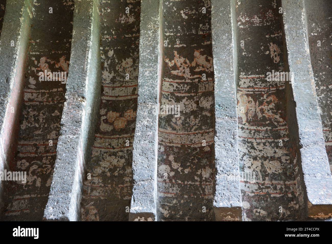 Cave No. 26. Traces of painted flying figures in-between the stone ...