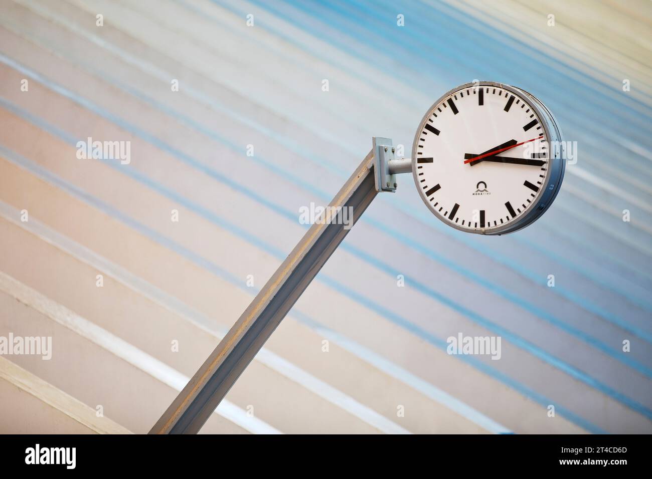 Liege-Guillemins station in modern industrial style, station clock in ...