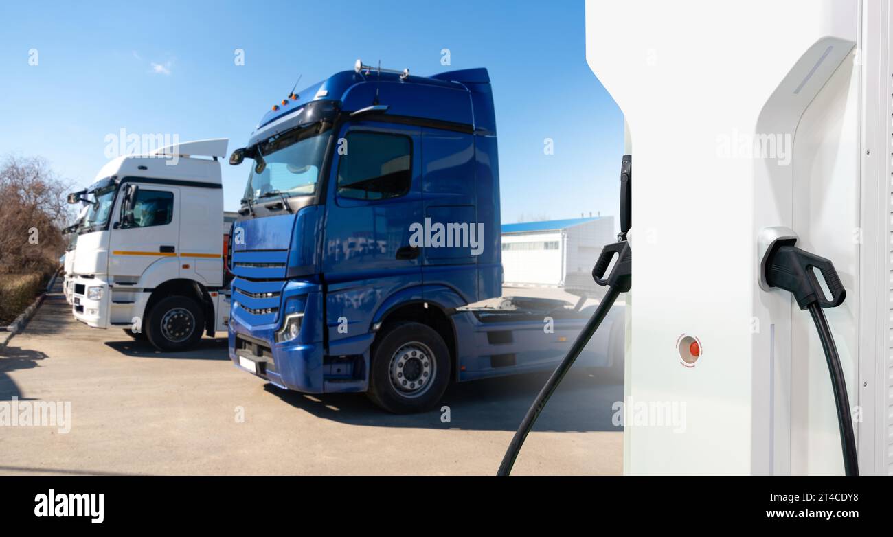 Semi truck fleet at the logistics center Stock Photo - Alamy