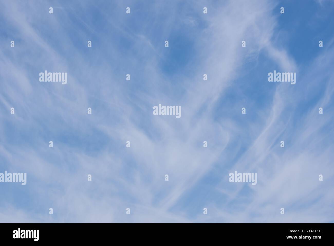 Blue sky with windy clouds. Natural background photo texture taken on ...