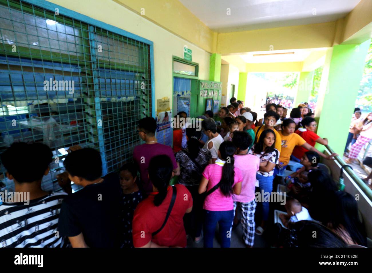 Philippines. 30th Oct, 2023. Voters lineup outside the poling precincts ...