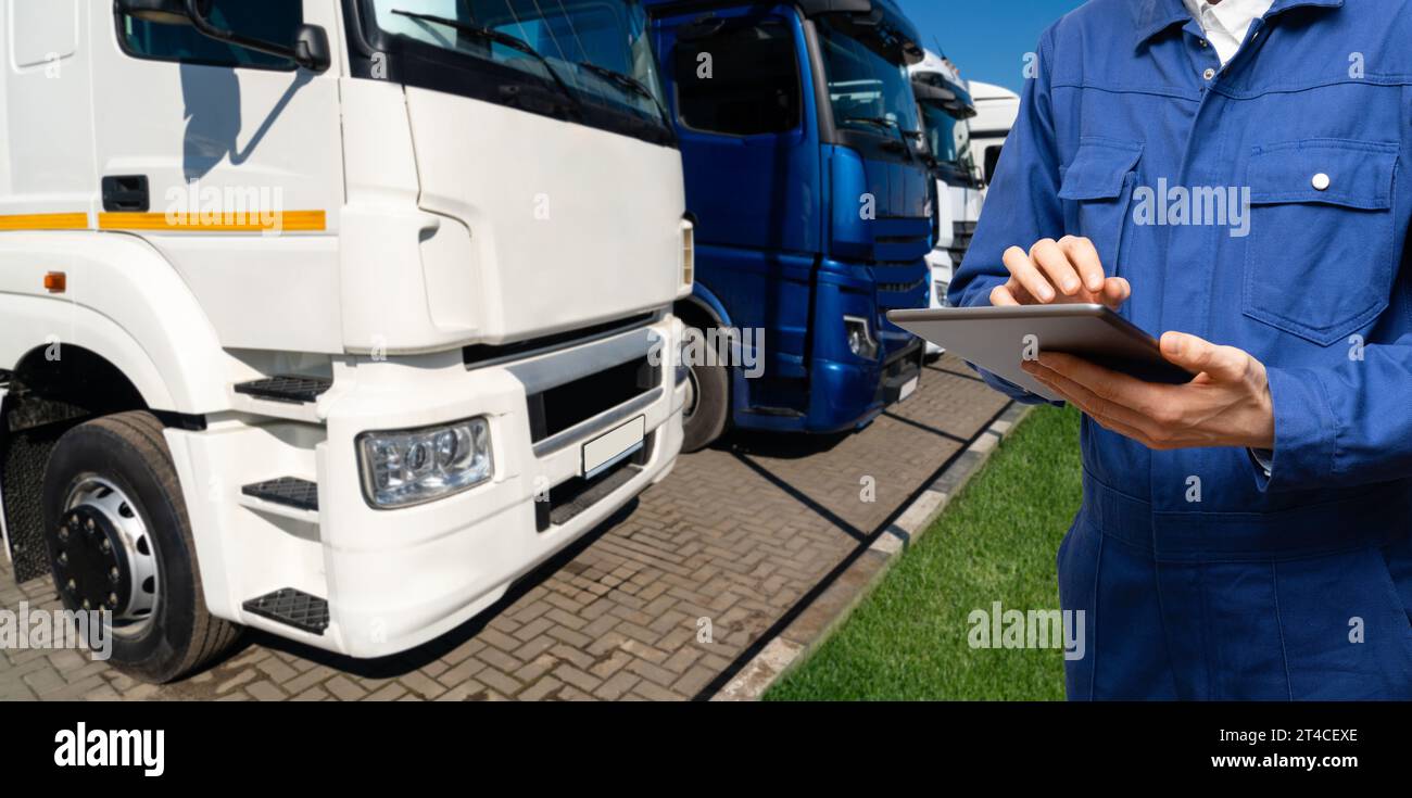Semi truck fleet at the logistics center Stock Photo - Alamy