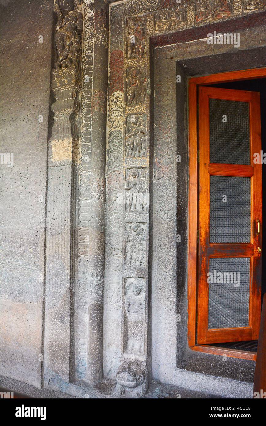 Cave No 1. Left portion of the main entrance doorway showing lion, Naga ...