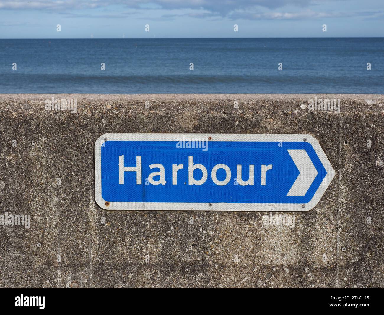 harbour direction sign on the sea front Stock Photo - Alamy