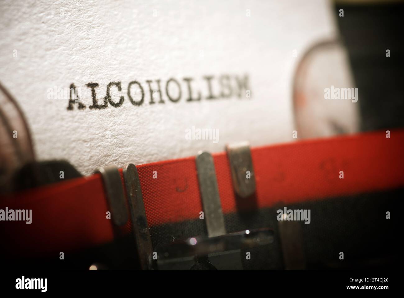 Alcoholism word written with a typewriter Stock Photo - Alamy