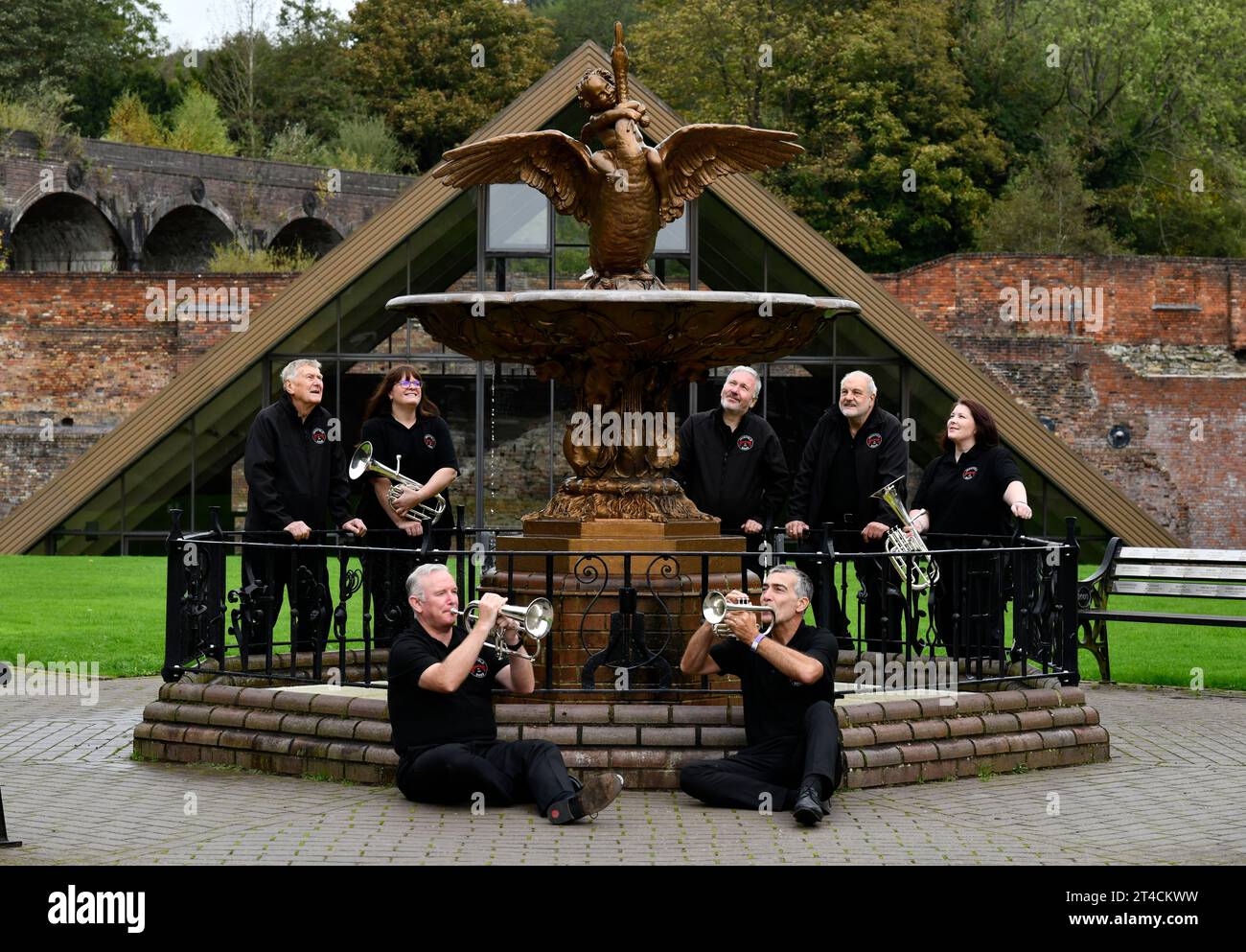 Members of Jackfield Band and the Boy and Swan cast iron water fountain ...