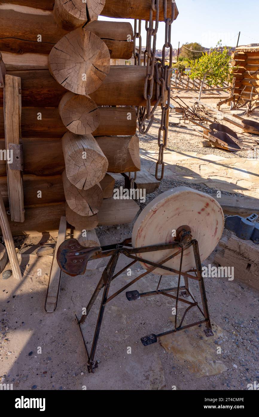 A foot-treadle sharpening wheel outside the blacksmith shop at the ...