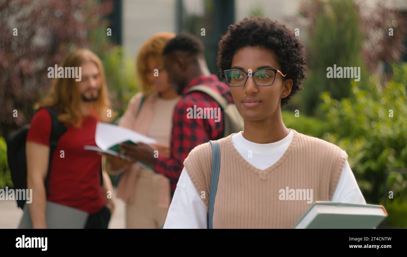 African American young student woman high school schoolgirl smiling toothy happy pupil girl ...