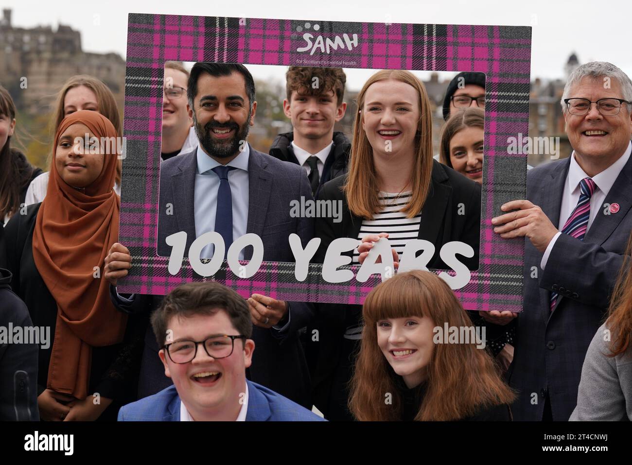 Scottish First Minister Humza Yousaf (centre left) with Isla Buchanan ...