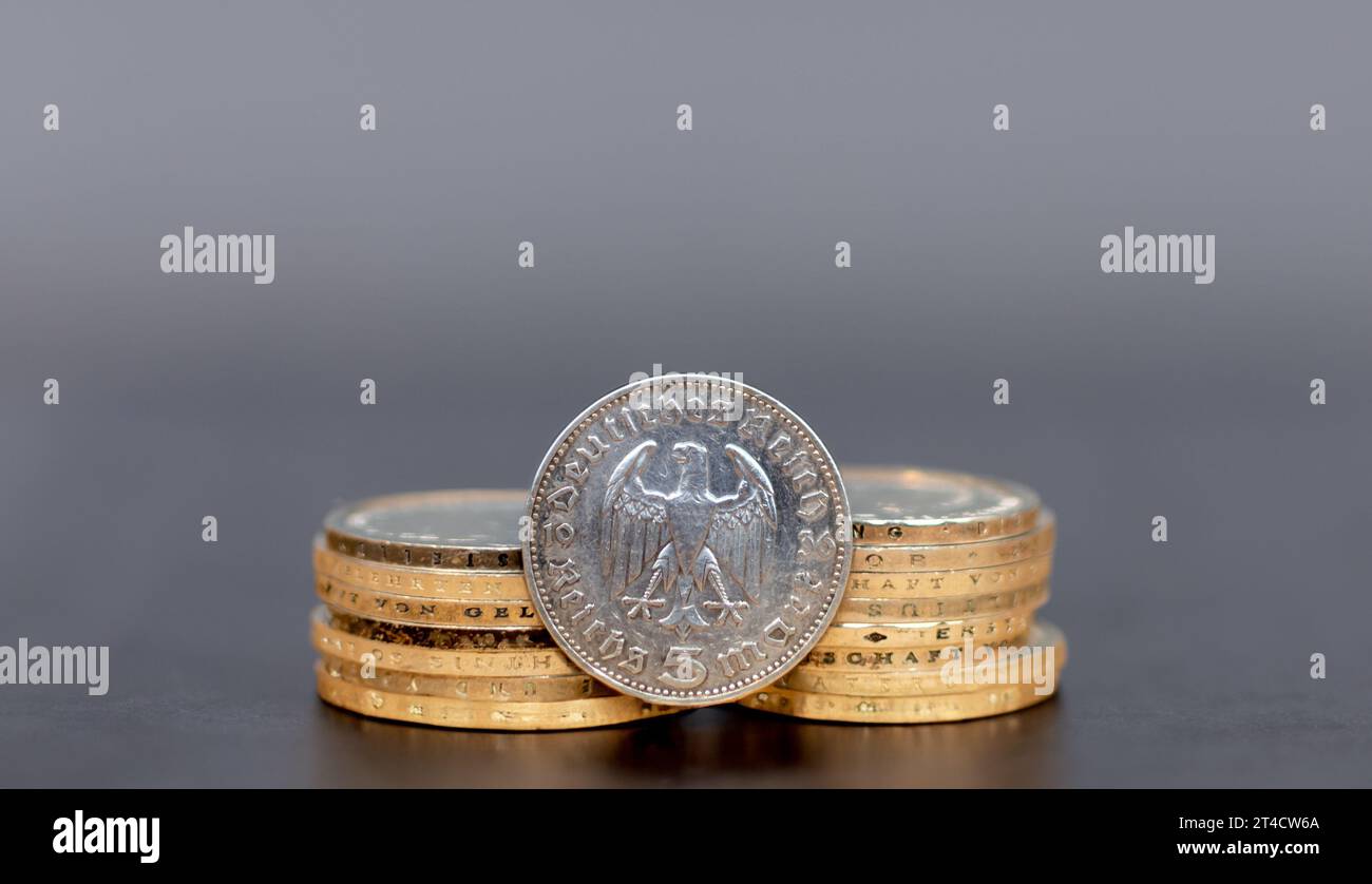 Stack of historic German coins. 5 German Reichsmark (currency) from ...