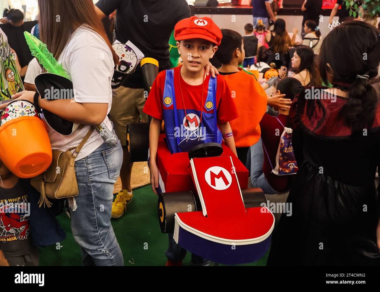 Pasig City. 30th Oct, 2023. A boy dressed like cartoon character Mario ...