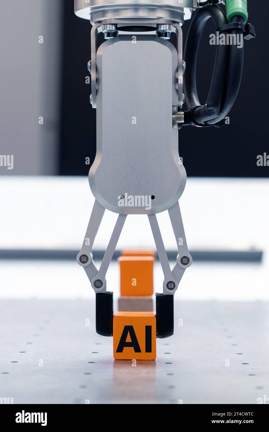 Modern handling robot - robotic arm. Smart factory Stock Photo - Alamy