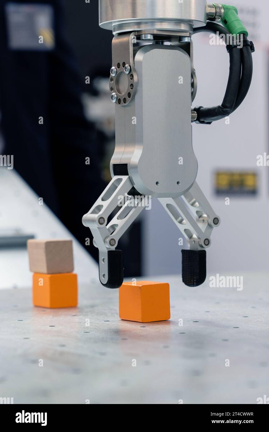 Modern handling robot - robotic arm. Smart factory Stock Photo - Alamy