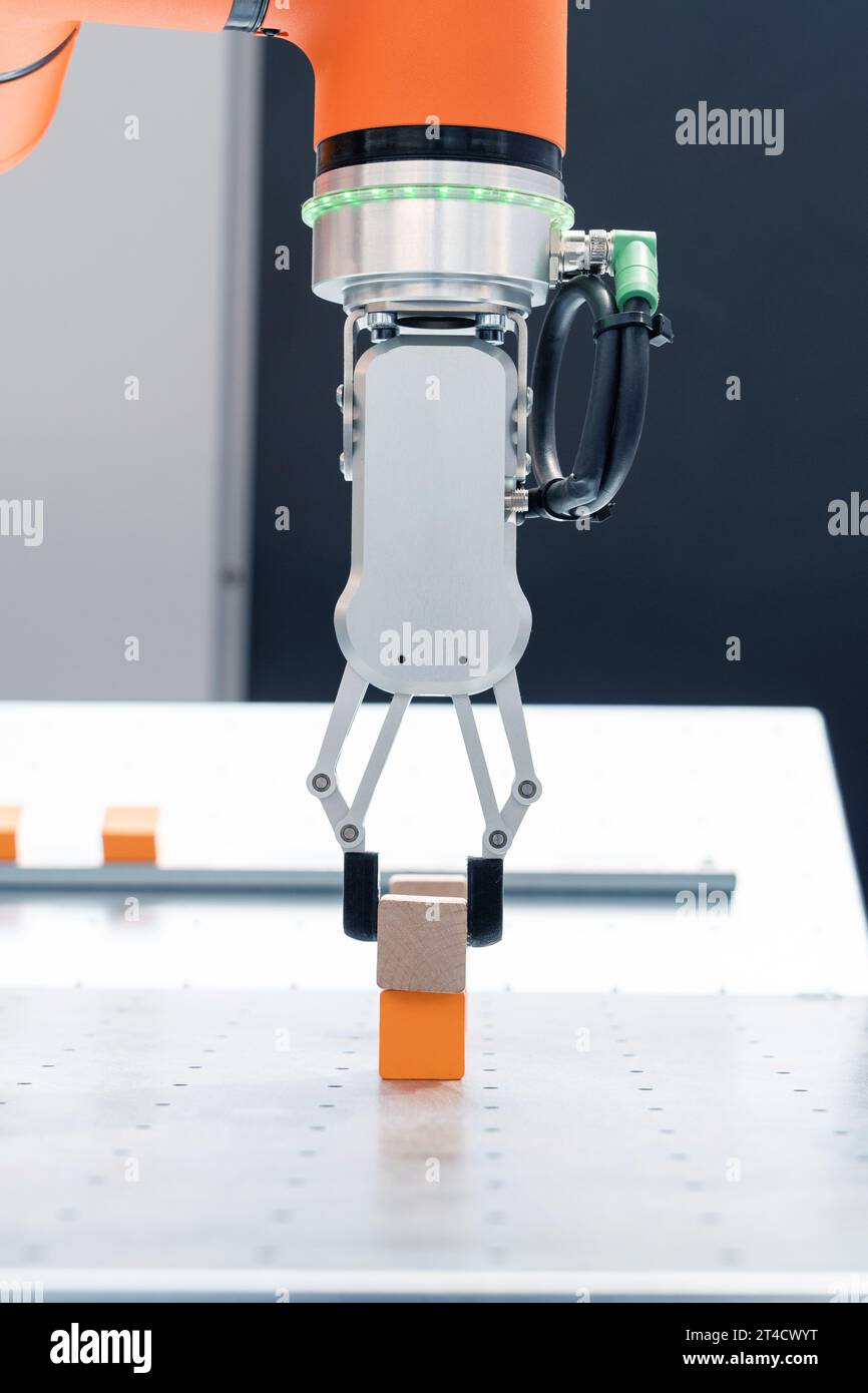 Modern handling robot - robotic arm. Smart factory Stock Photo - Alamy
